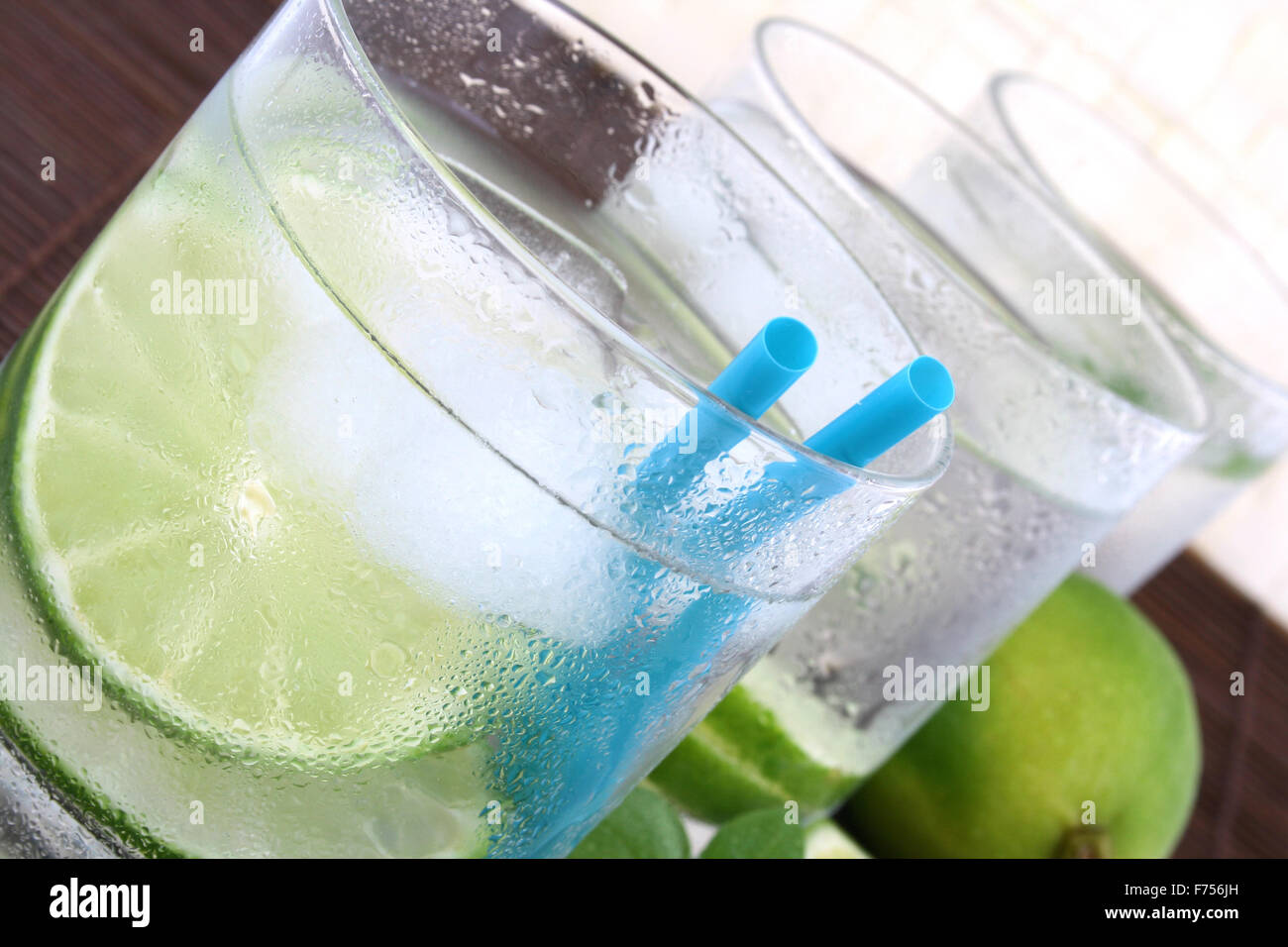 Frosty cold glass of ice water with lime Stock Photo - Alamy