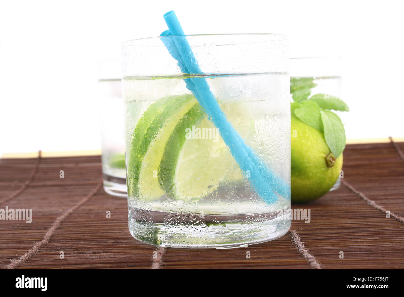 Frosty cold glass of ice water with lime Stock Photo - Alamy