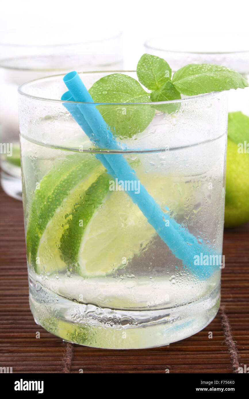 Frosty cold glass of ice water with lime Stock Photo - Alamy