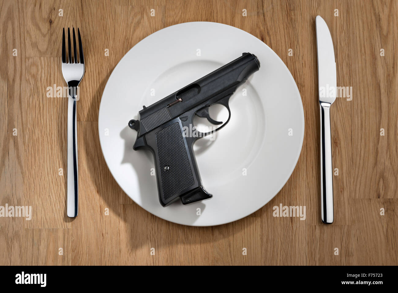 Pistol table hi-res stock photography and images - Alamy