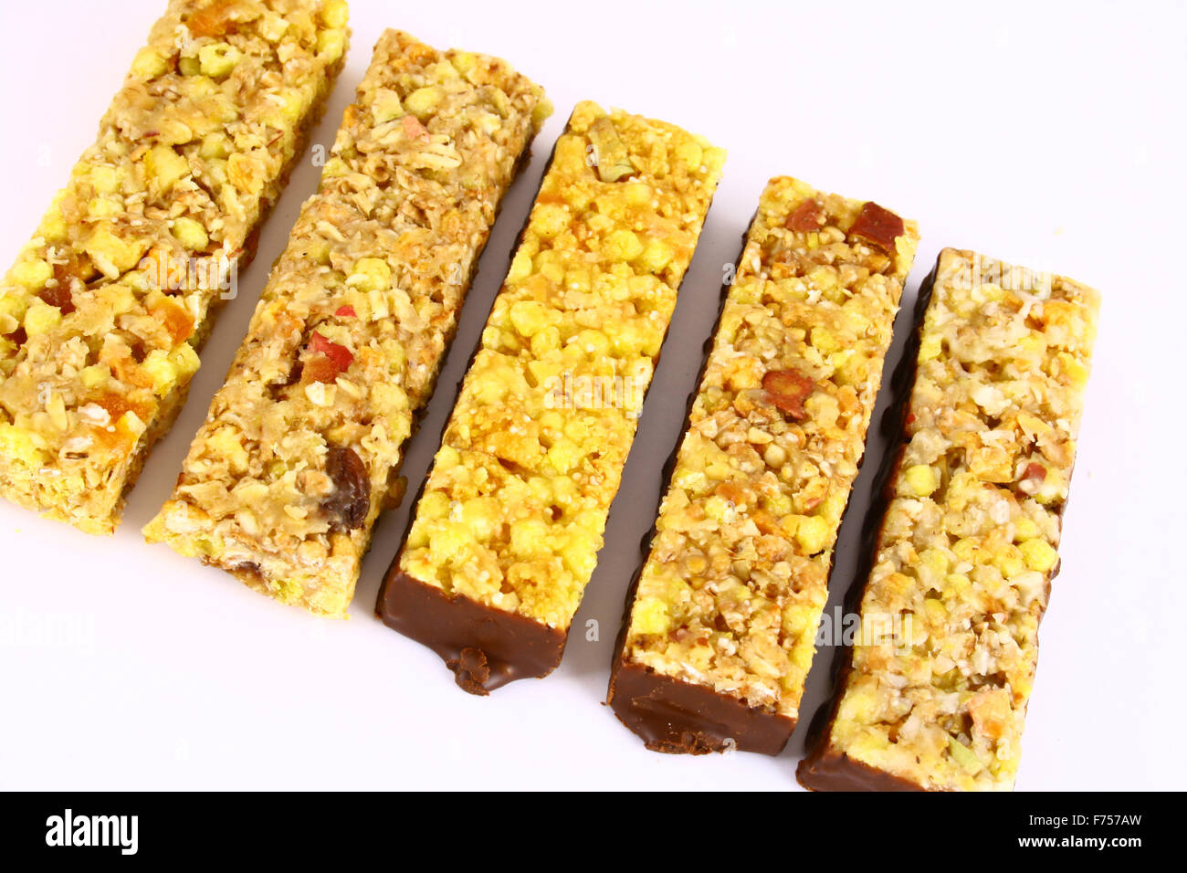 Muesli stick on white background Stock Photo - Alamy