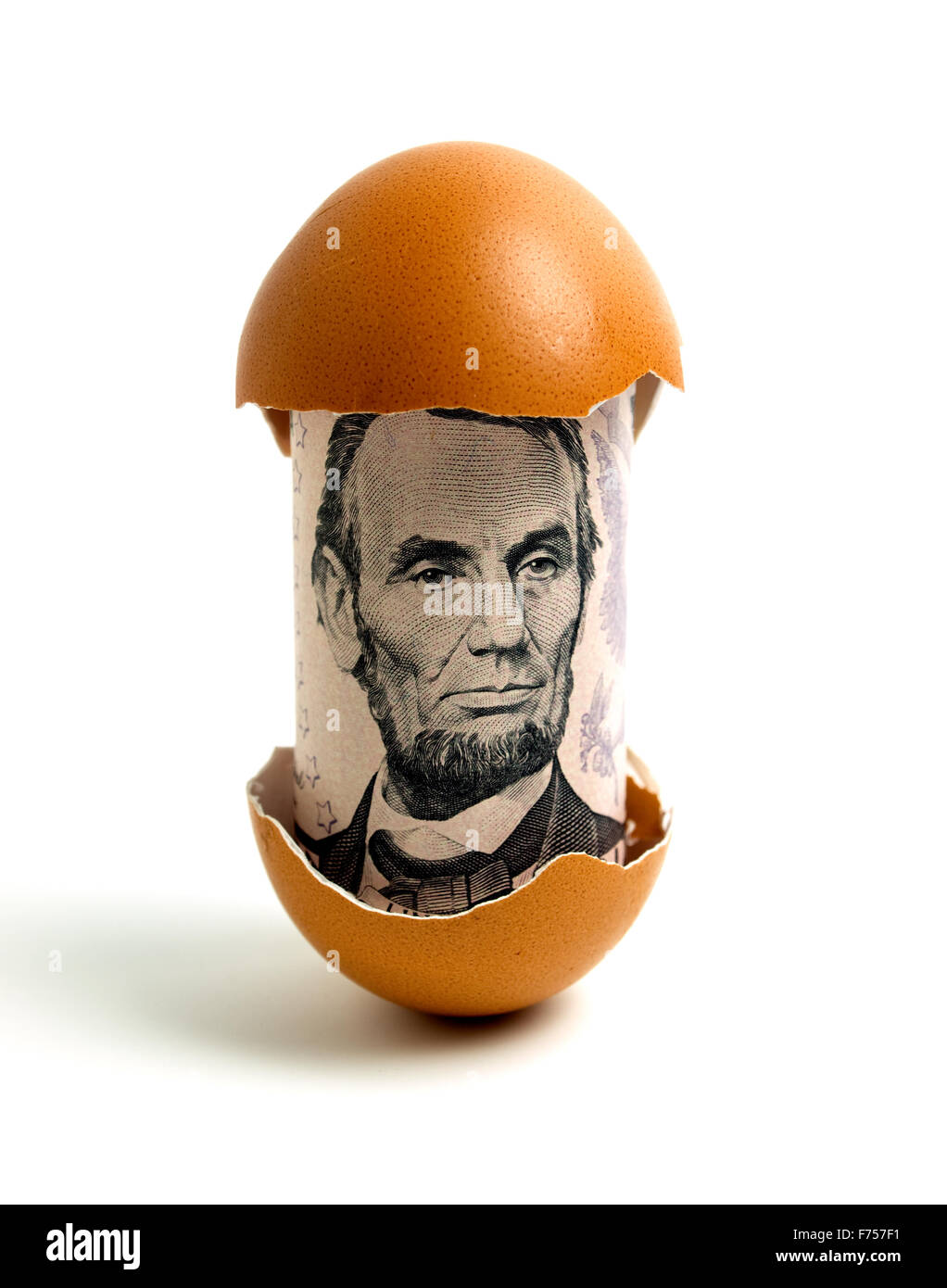 Egg of Money Stock Photo - Alamy