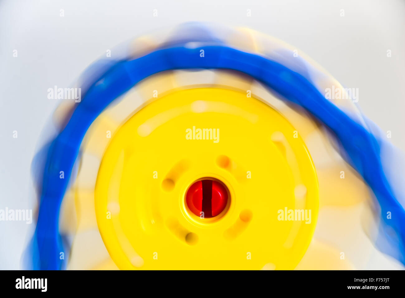 Gears from colorful children game Stock Photo - Alamy