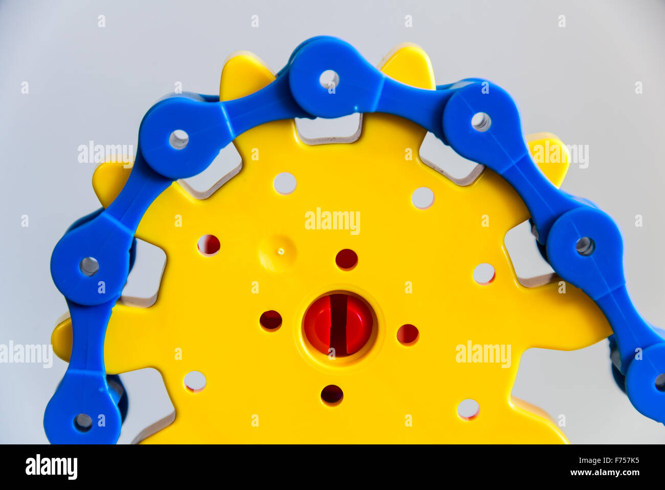 Gears from colorful children game Stock Photo - Alamy