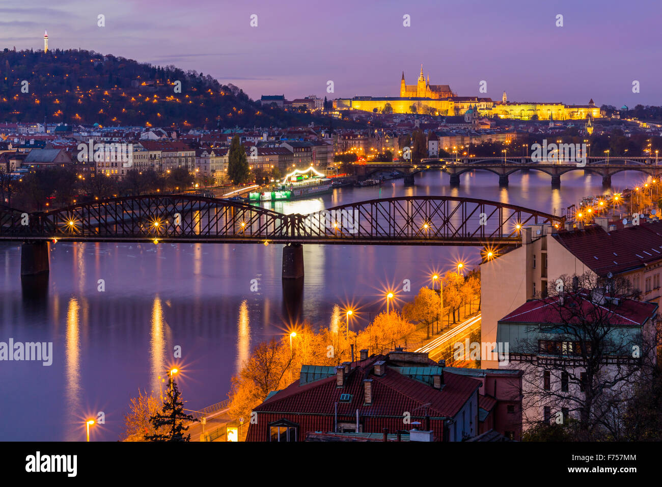 view of the prague castle and railway bridge over vltava/moldau river ...
