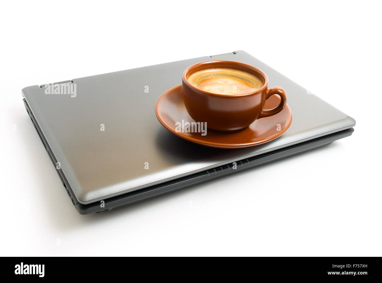 Coffee cup & laptop Stock Photo - Alamy