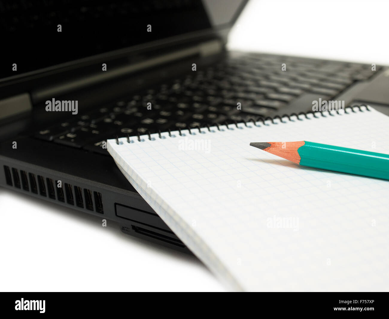 Notebook and pencil Stock Photo - Alamy