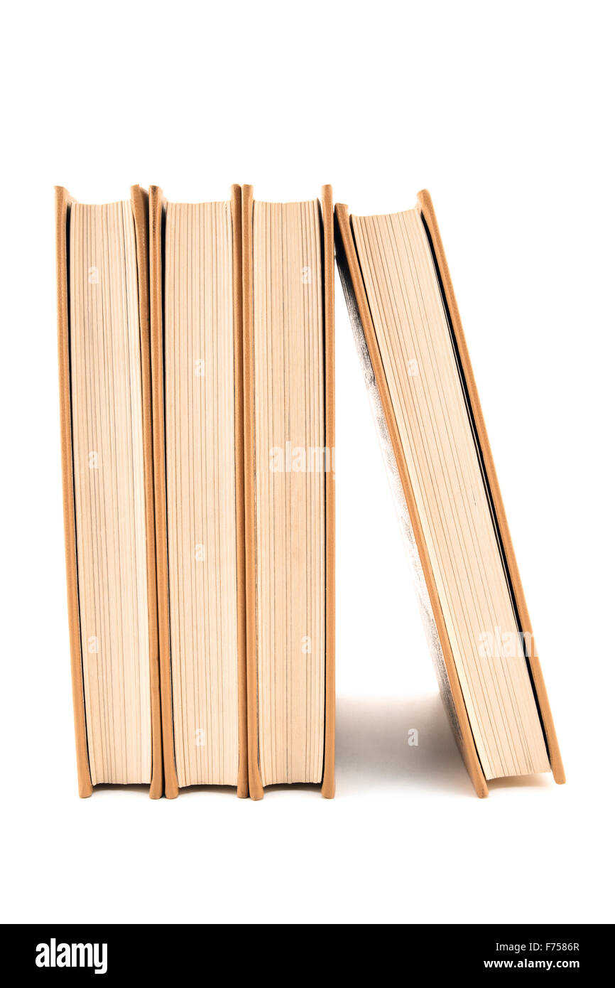 Four books on white background Stock Photo - Alamy
