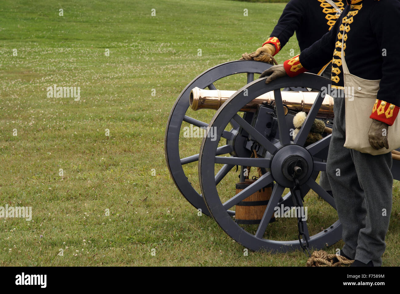 Soldiers in the uniform with a canon Stock Photo - Alamy