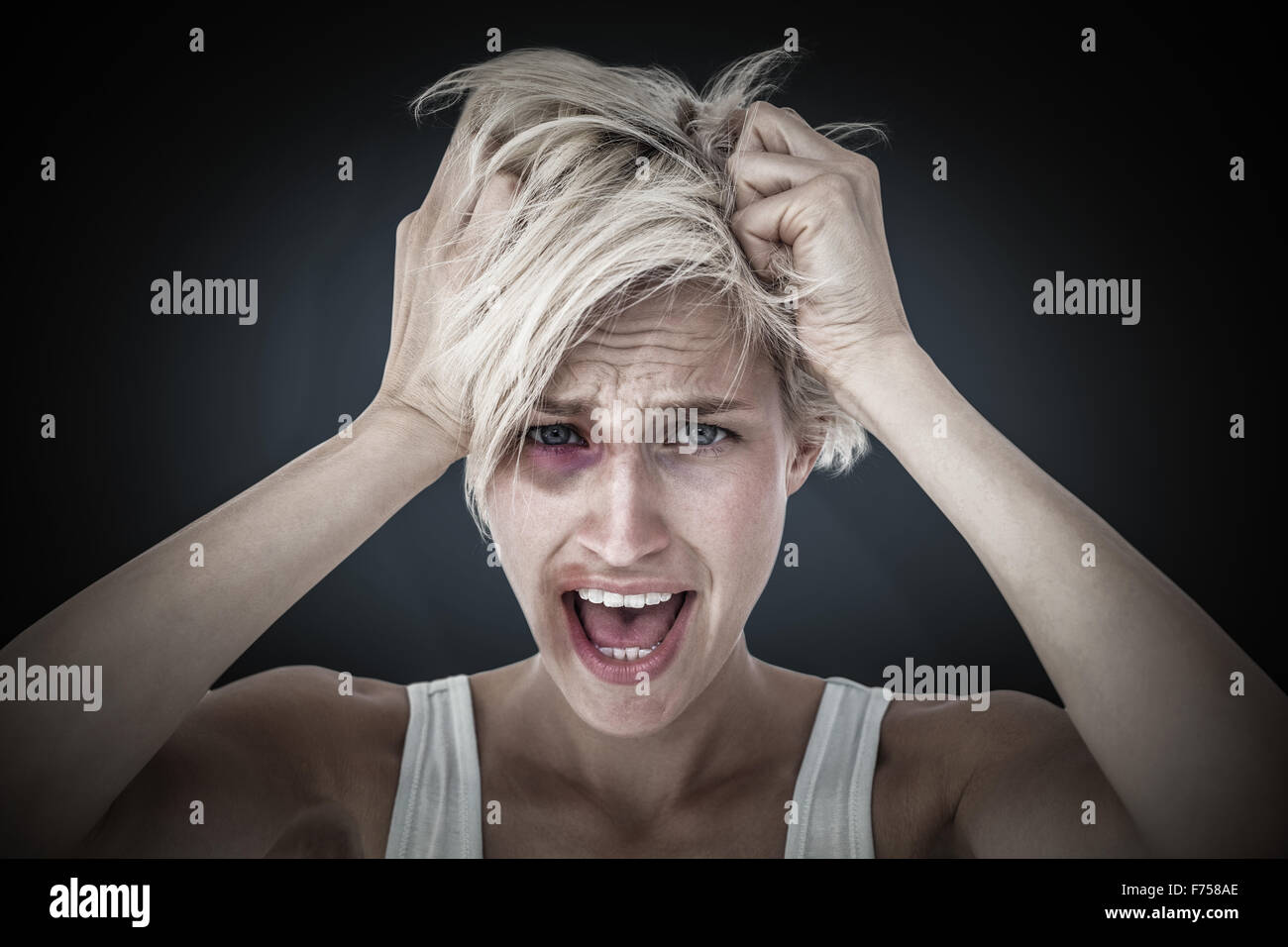 Woman screaming holding head hi-res stock photography and images - Alamy