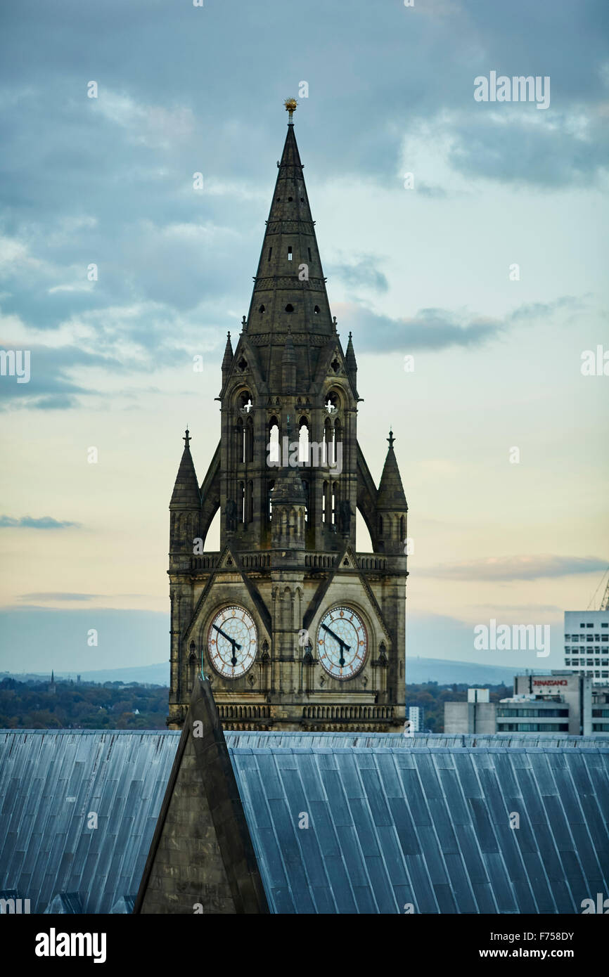 Manchester skyline showing the rooftops and the clock tower of the town ...