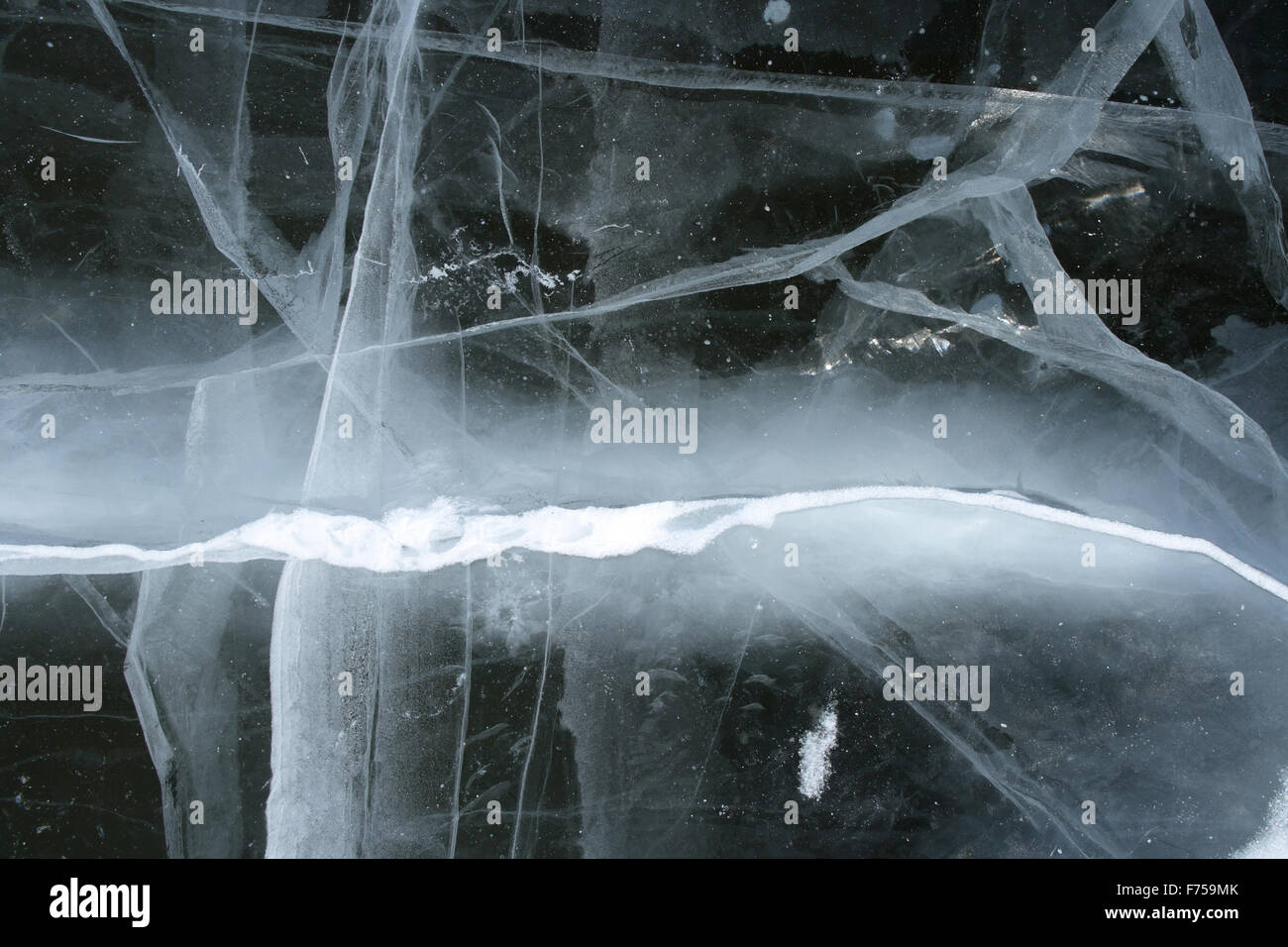 Cracked ice - snowy "lightning Stock Photo - Alamy