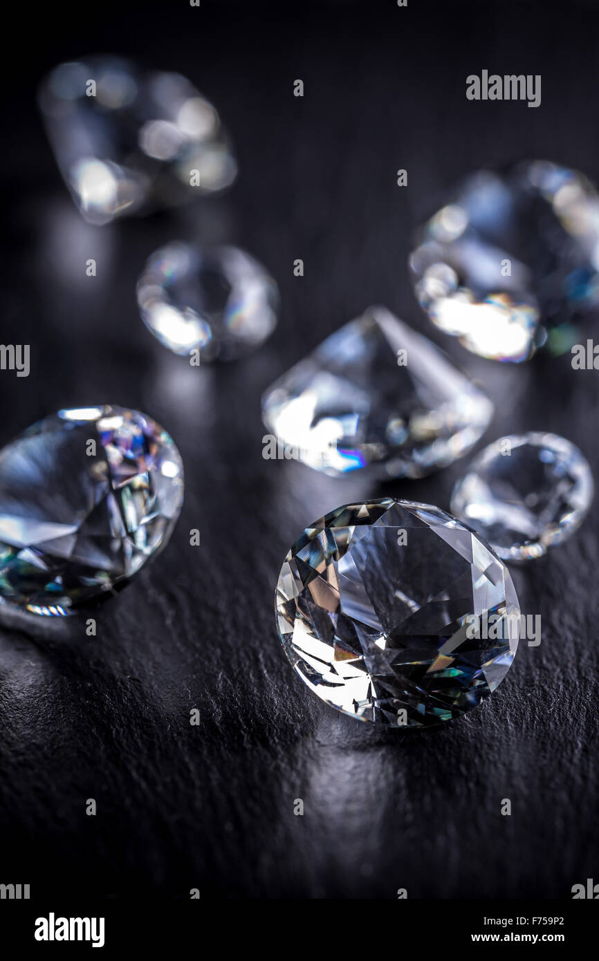 Diamonds on black background, close up Stock Photo - Alamy