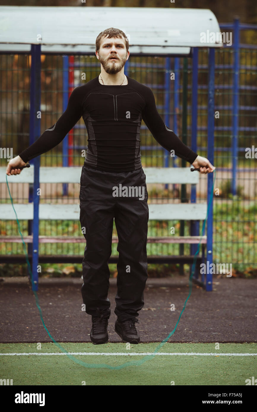 healthy athlete jumping with skipping rope outdoor Stock Photo - Alamy