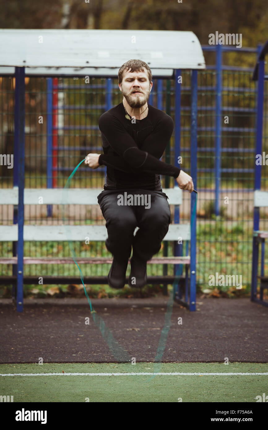 healthy athlete jumping with skipping rope outdoor Stock Photo - Alamy