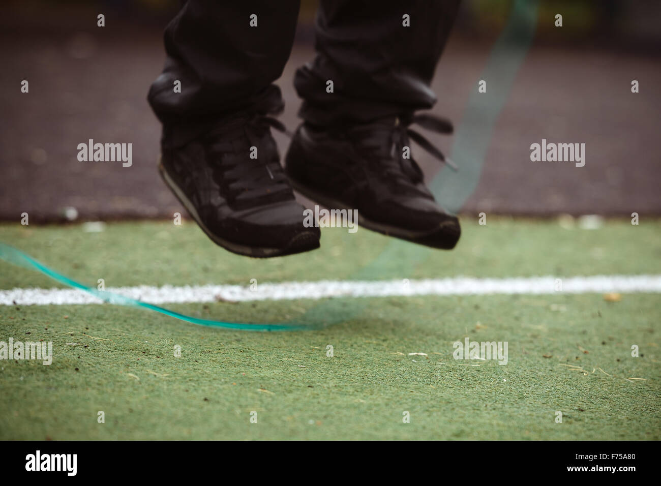healthy athlete jumping with skipping rope outdoor Stock Photo - Alamy