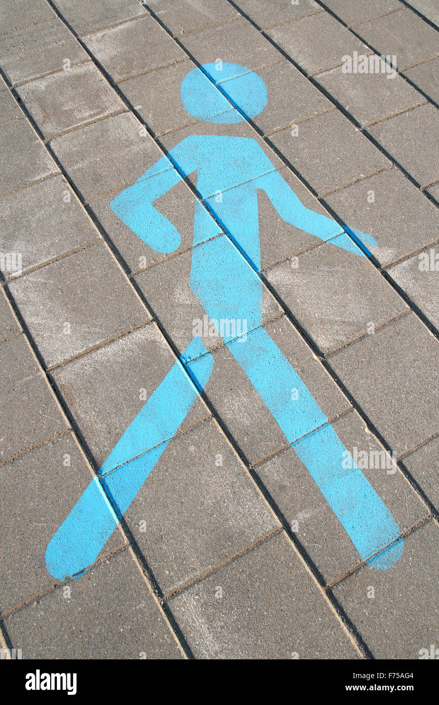 Pedestrian sign on the pavement Stock Photo - Alamy