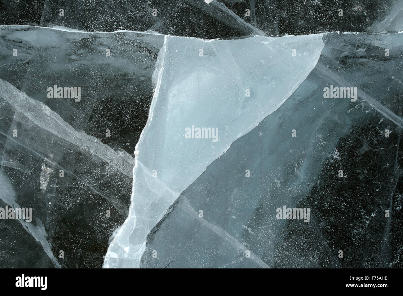 Triangular shape of a cracked ice Stock Photo - Alamy