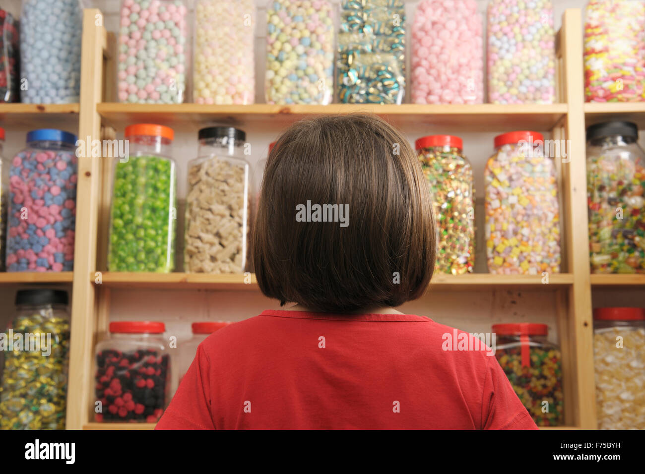 child in sweet shop Stock Photo - Alamy