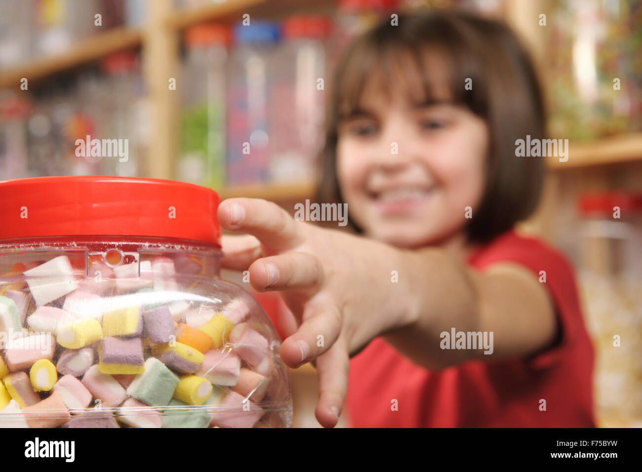 child in sweet shop Stock Photo - Alamy