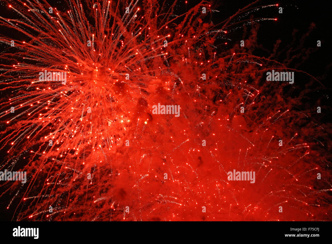 Red fireworks explosion Stock Photo - Alamy