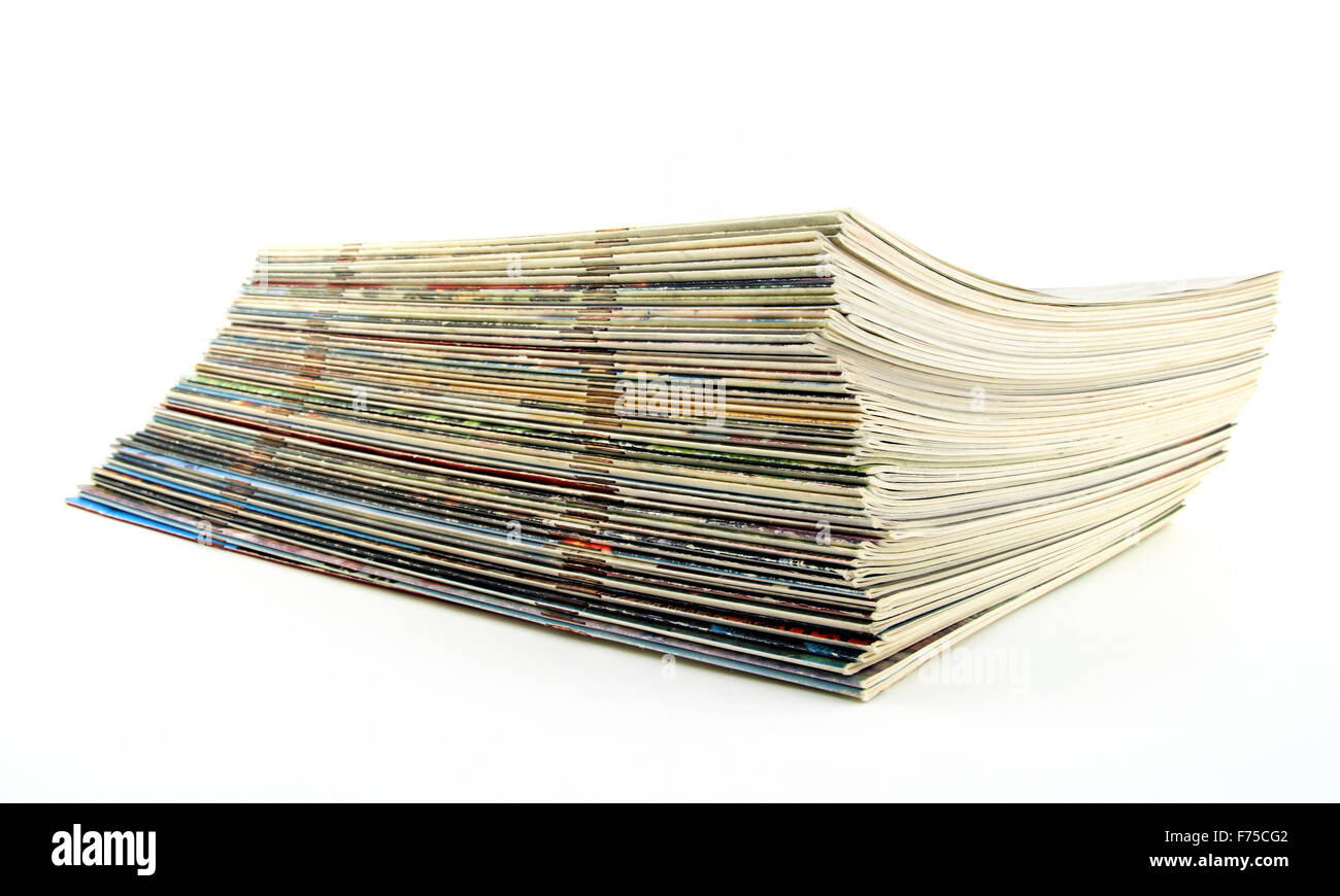 Stack of old thin magazines Stock Photo - Alamy
