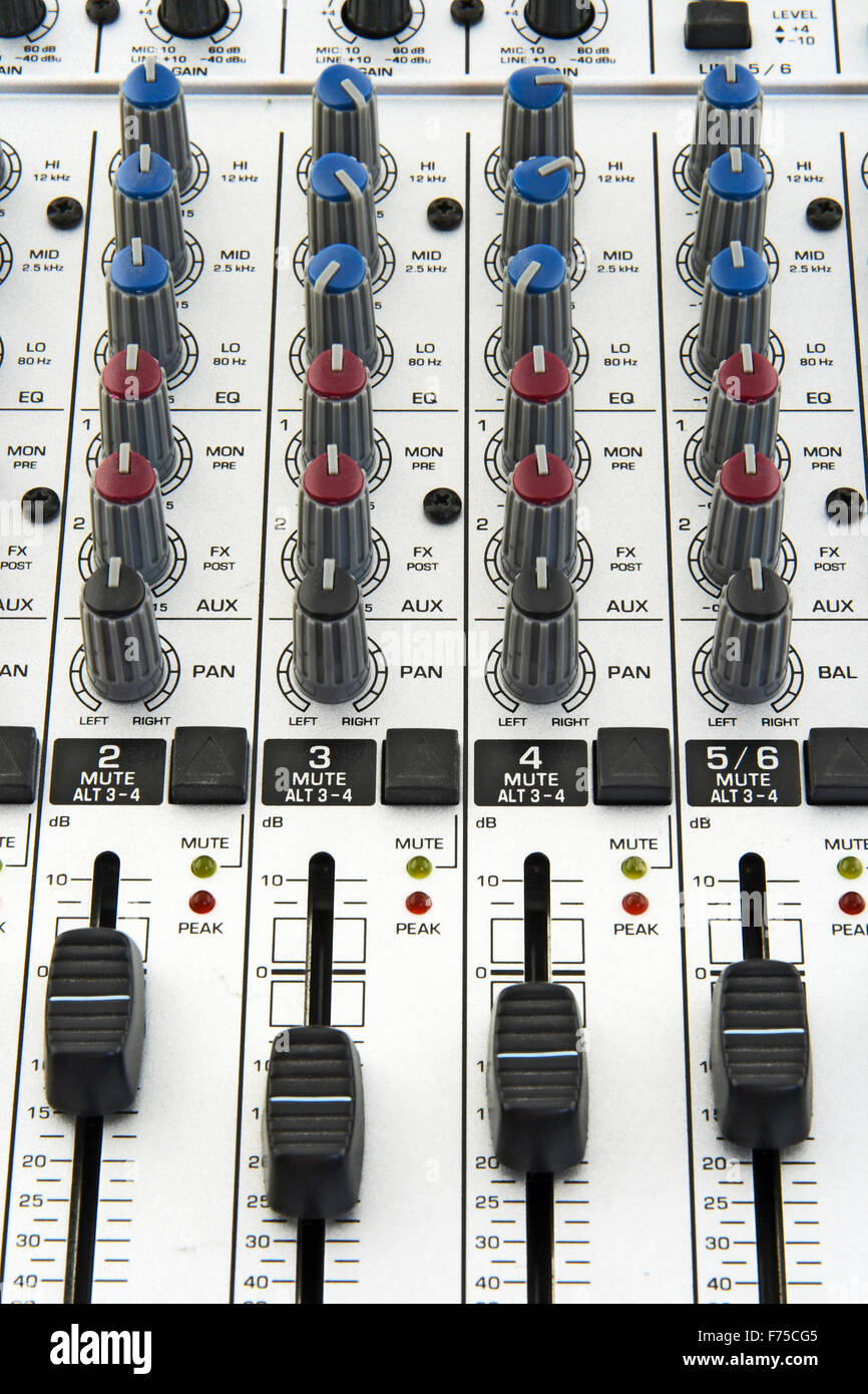 Faders and knobs of sound mixer Stock Photo - Alamy
