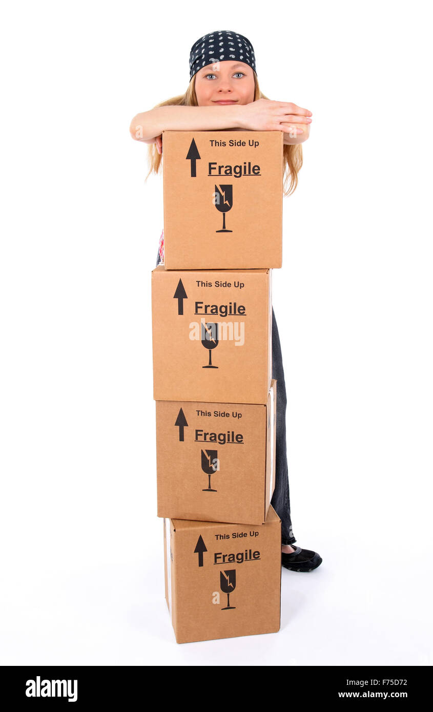 Girl with a stack of cardboard boxes Stock Photo - Alamy