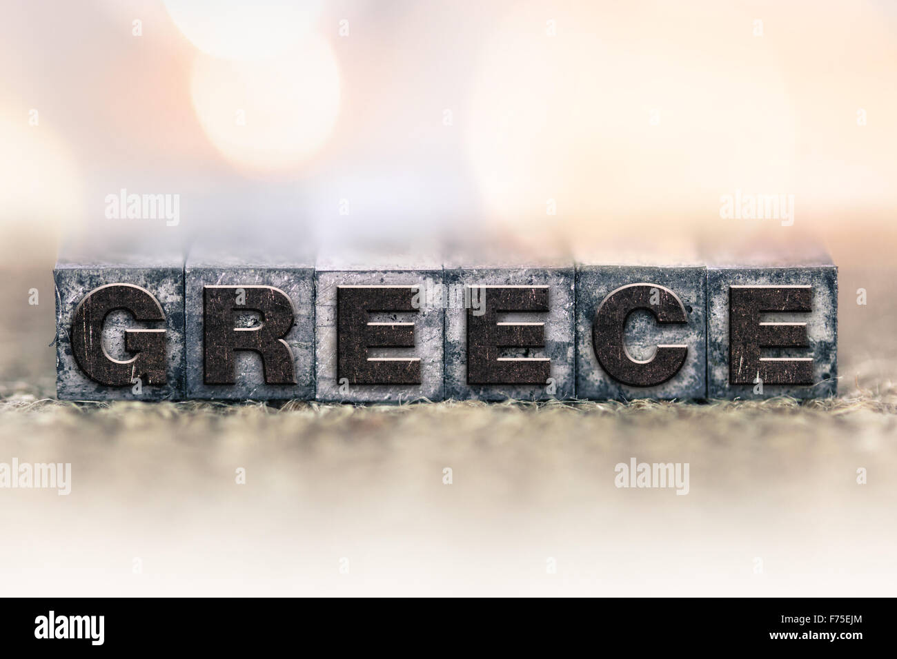 The word "GREECE" written in vintage ink stained letterpress type Stock ...