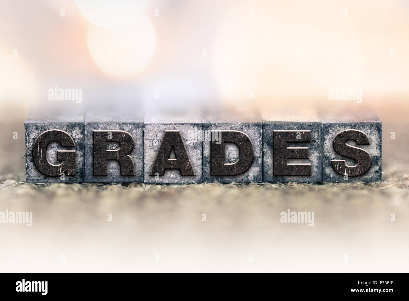 The word "GRADES" written in vintage ink stained letterpress type Stock ...