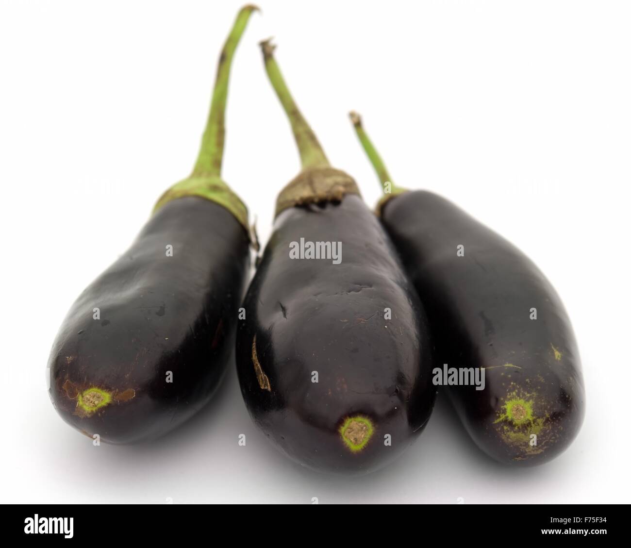 Three big eggplants Stock Photo - Alamy