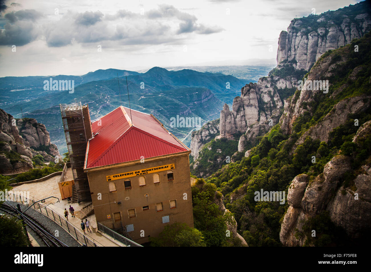 Yellow funicular in Montserrat Monastery in the mountains near ...