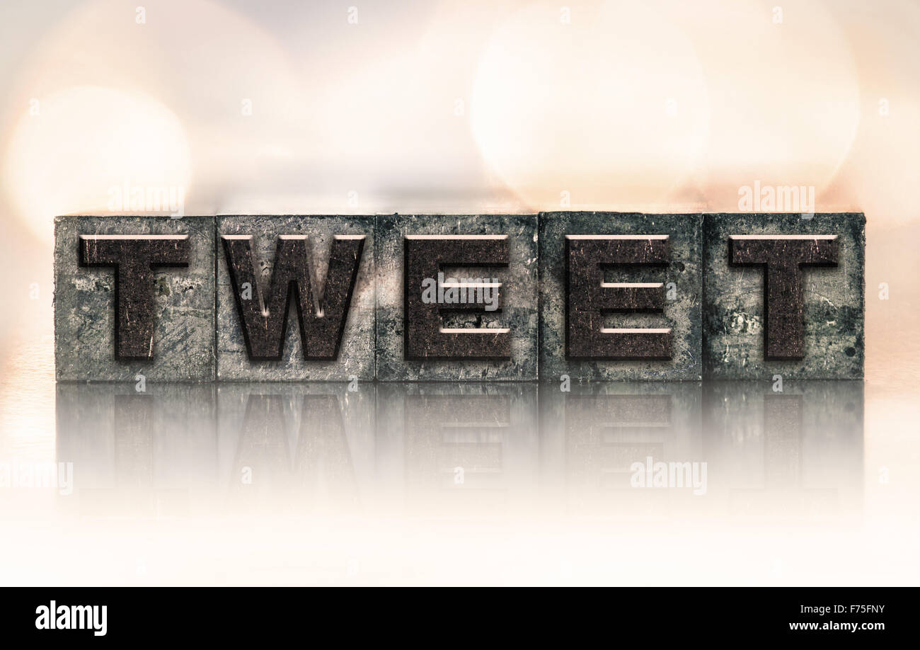 The word "TWEET" written in vintage ink stained letterpress type Stock ...