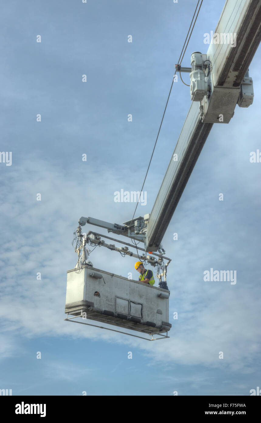 Crane-Suspended Manbasket elevated work platform Stock Photo - Alamy