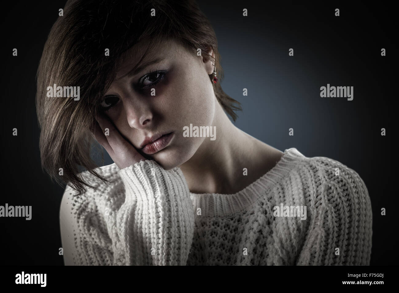 Sad brunette hi-res stock photography and images - Alamy