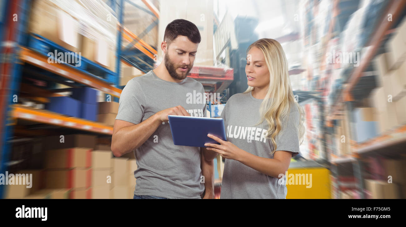 Male volunteer lifting clothes hi-res stock photography and images - Alamy