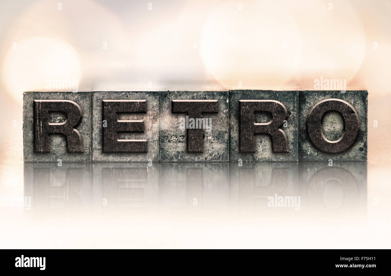 The word "RETRO" written in vintage ink stained letterpress type Stock ...