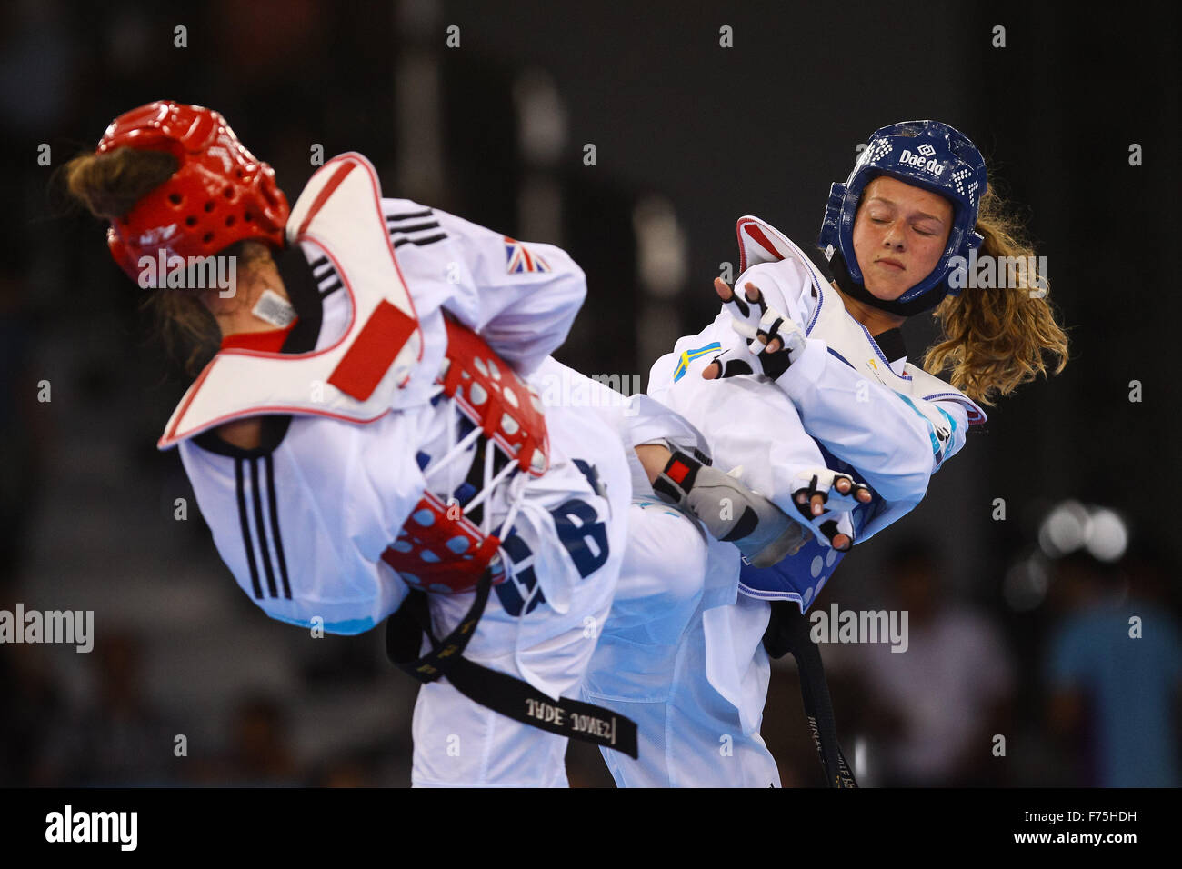 Jade Jones (GBR, red) competes with Nikita Glasnovic (SWE, blue ...