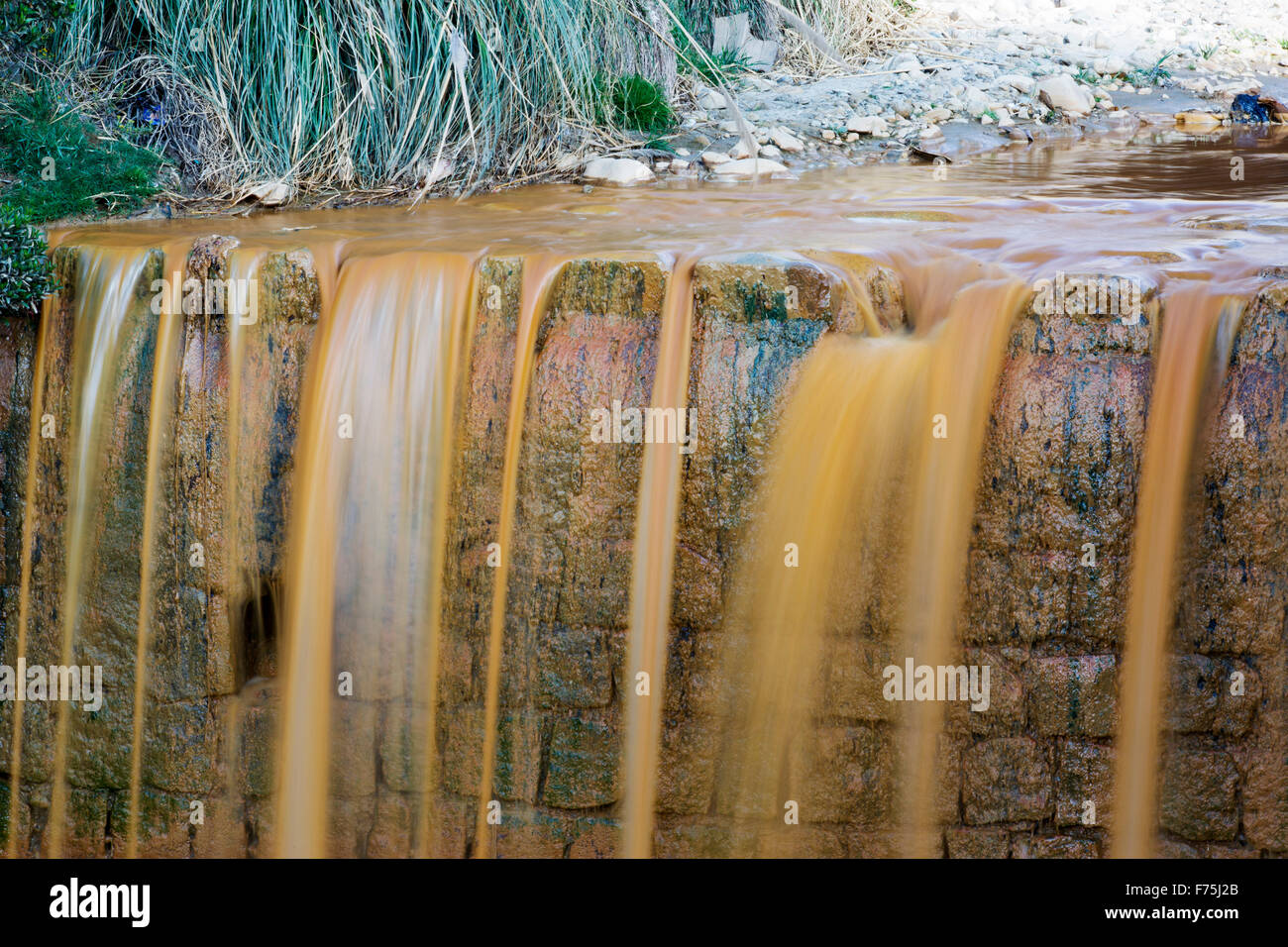 A river full of water contaminated by mine effluent in La Paz, Bolivia ...