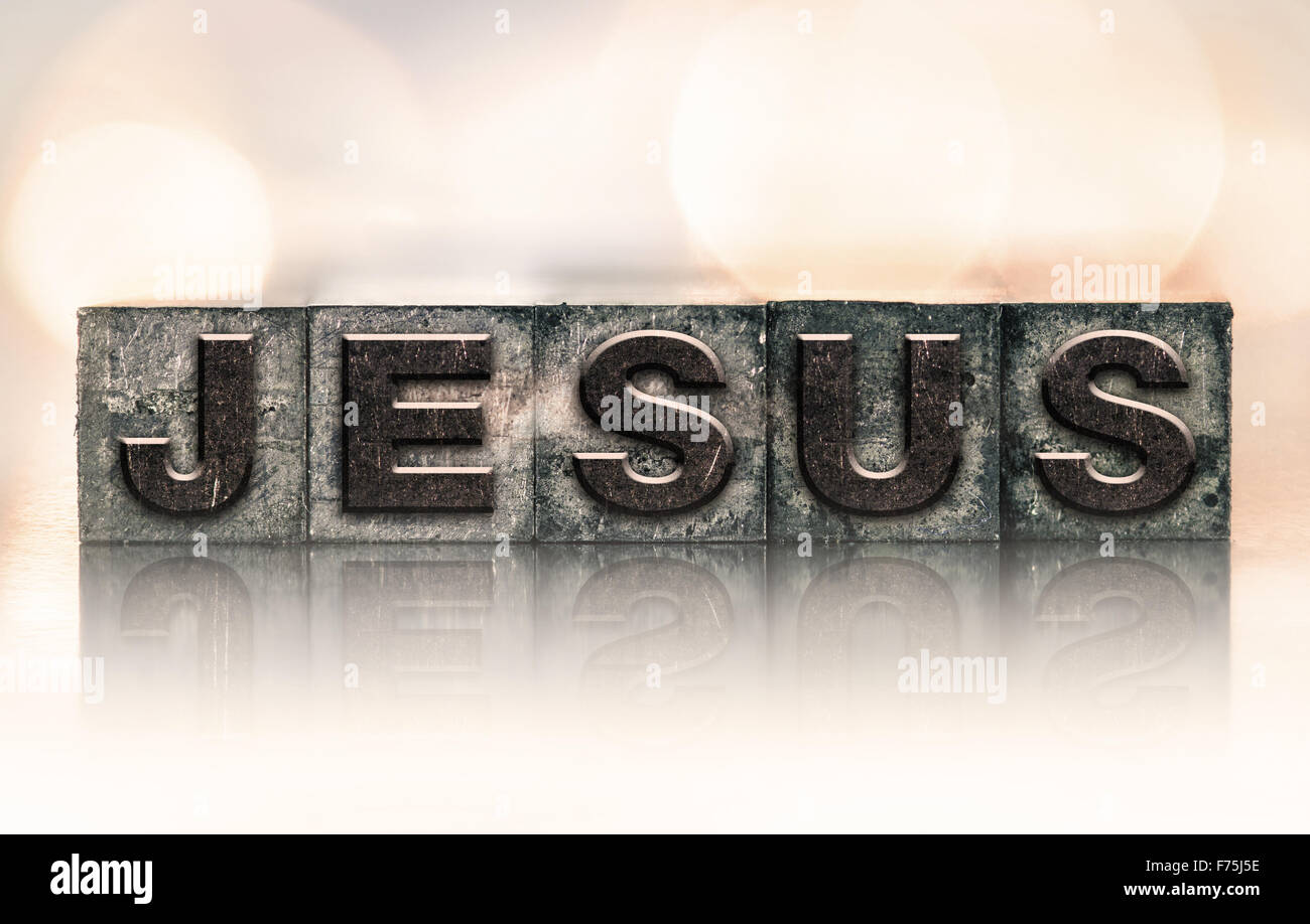The name "JESUS" written in vintage ink stained letterpress type Stock ...