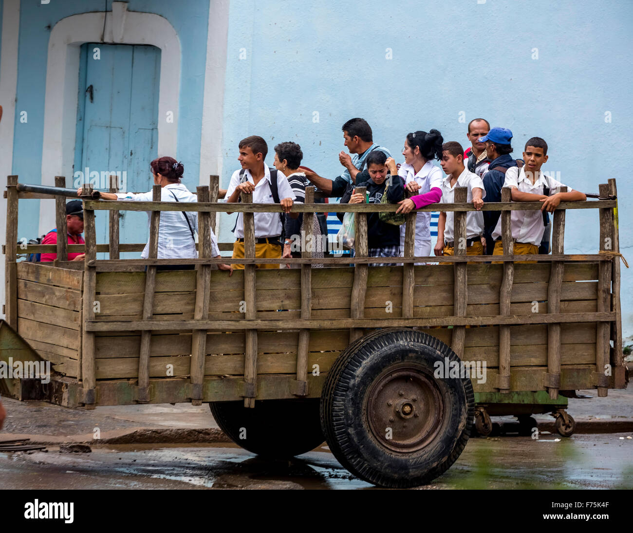 Students on uniaxial trailer, Cuban students vans, school bus, public ...
