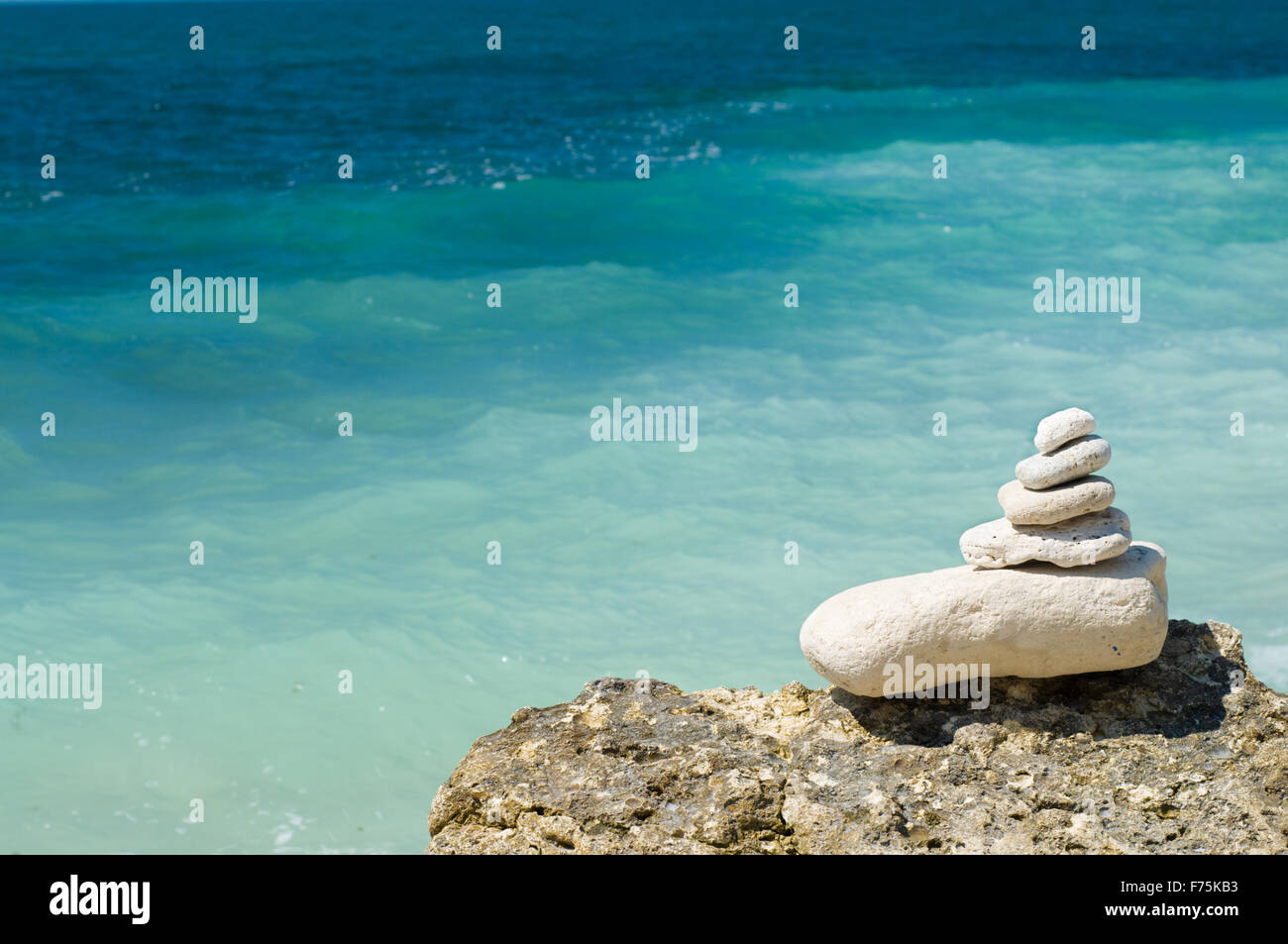 stacked pebbles on the beach Stock Photo - Alamy