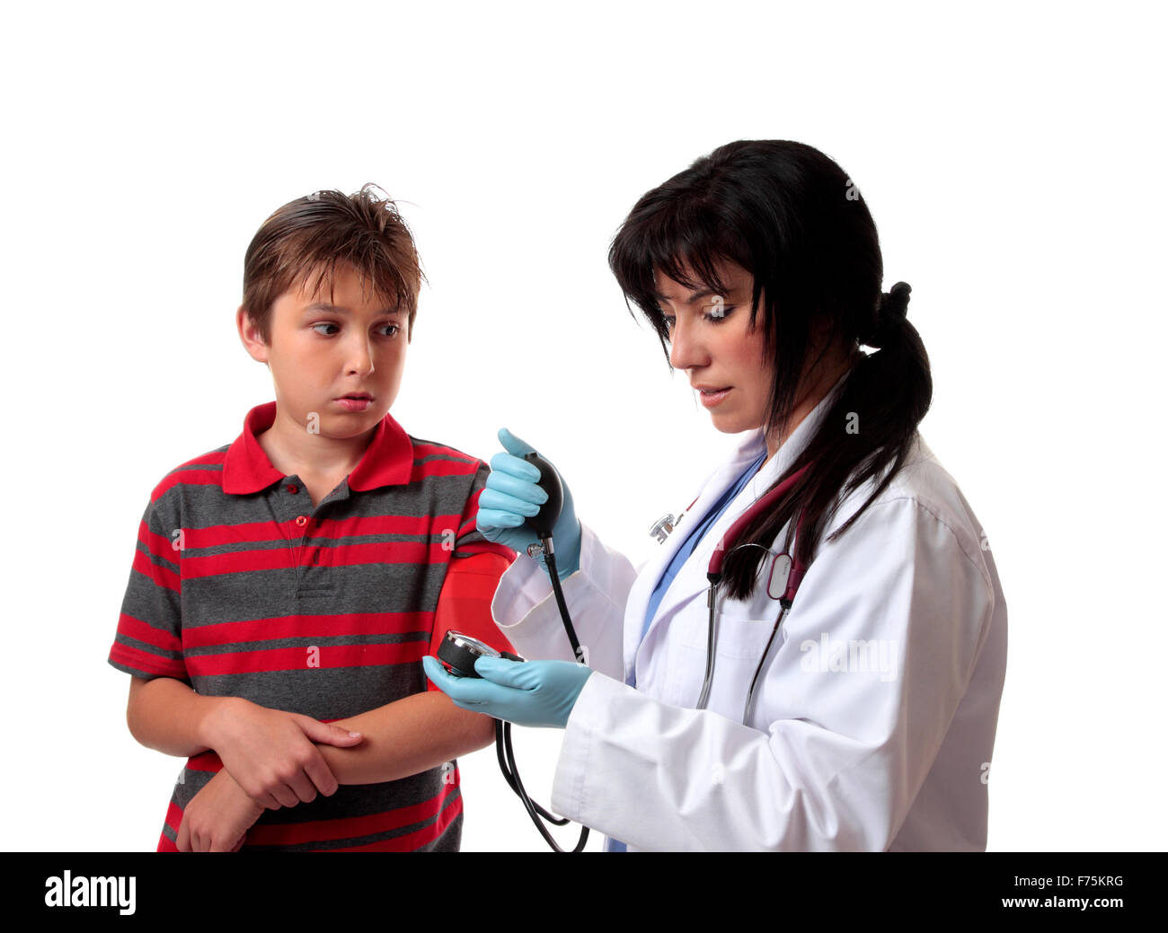 Nurse taking blood pressure boy hi-res stock photography and images - Alamy