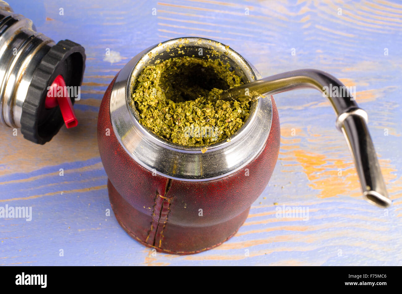 Mate herb brewing in its traditional gourd Stock Photo - Alamy