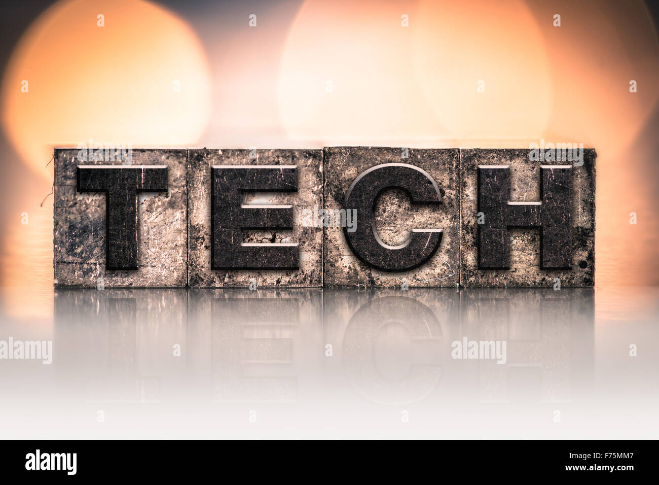 The word "TECH" written in vintage ink stained letterpress type Stock ...