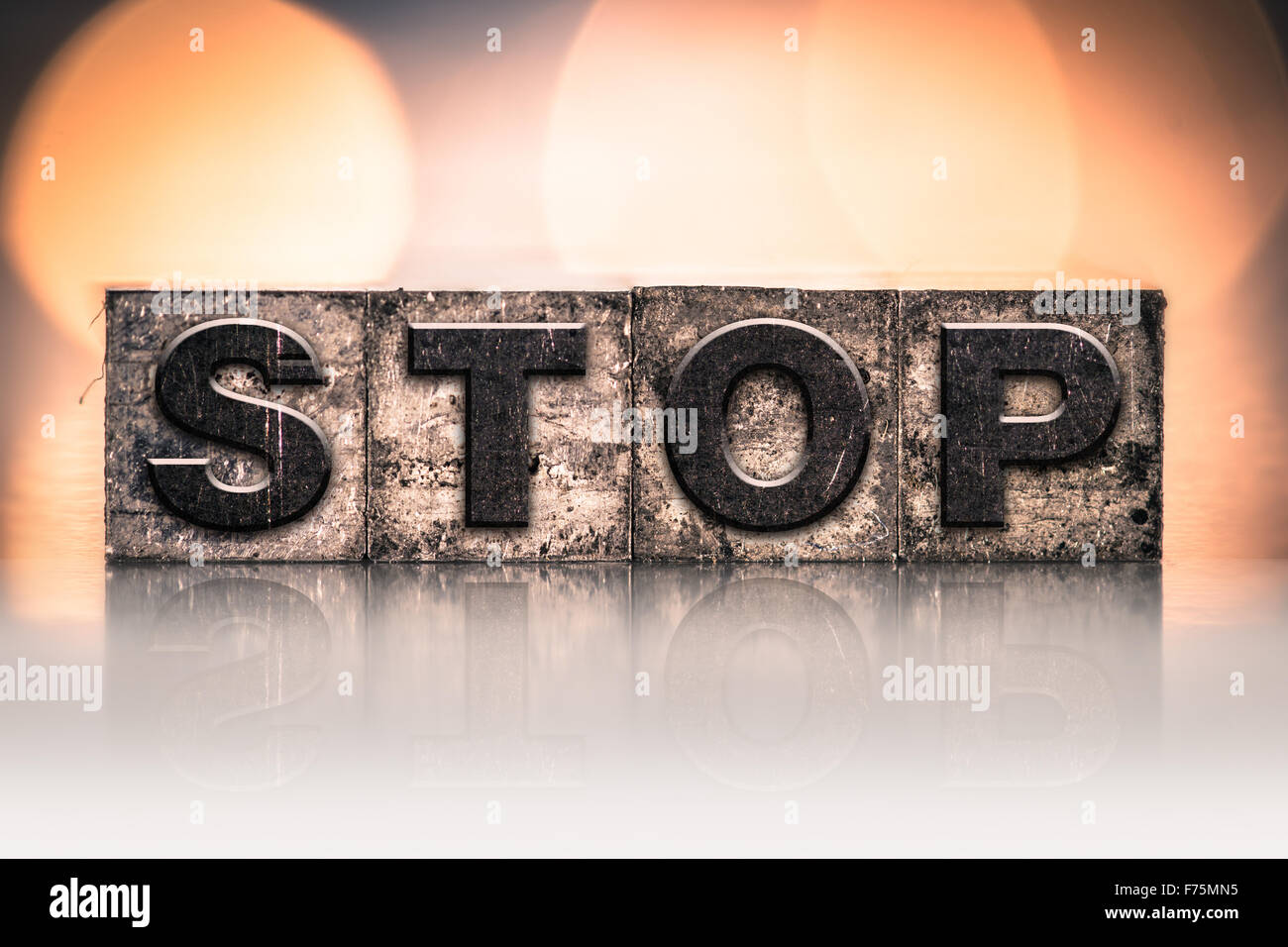 The word "STOP" written in vintage ink stained letterpress type Stock ...