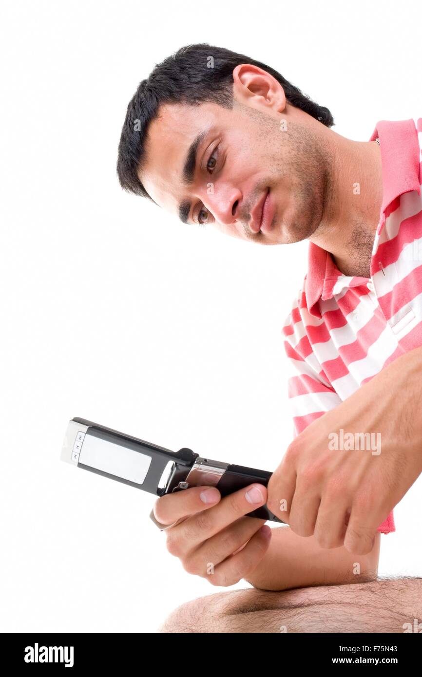 Young man with mobile phone Stock Photo - Alamy