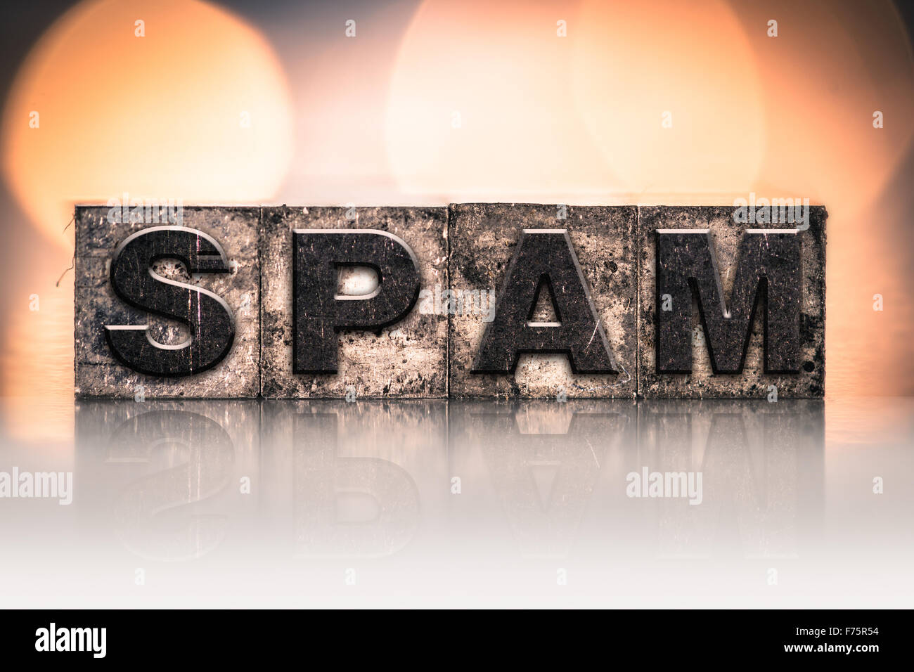 The word "SPAM" written in vintage ink stained letterpress type Stock ...