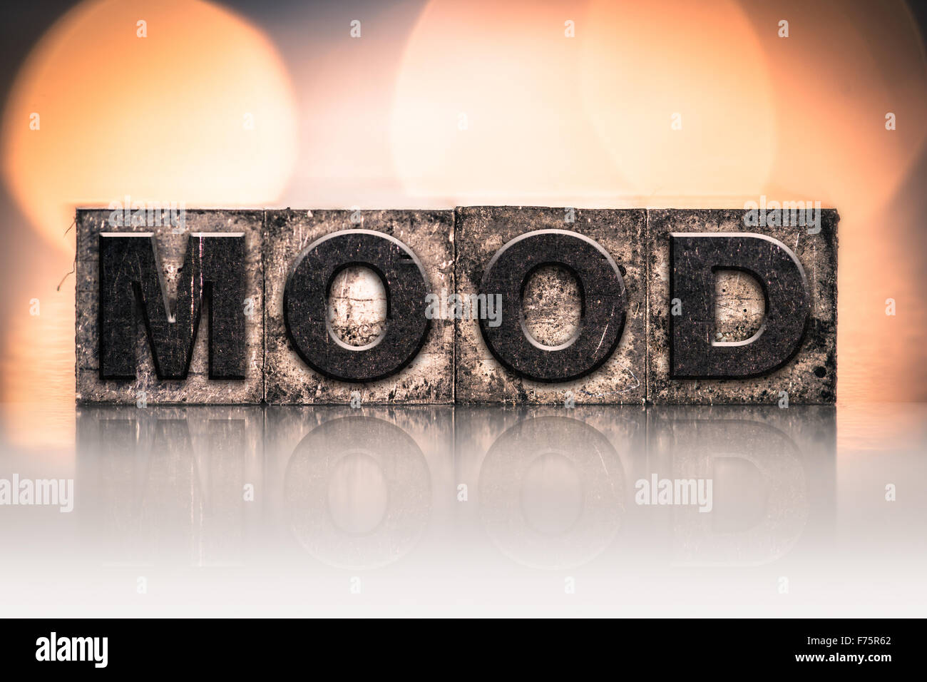 The word "MOOD" written in vintage ink stained letterpress type Stock ...
