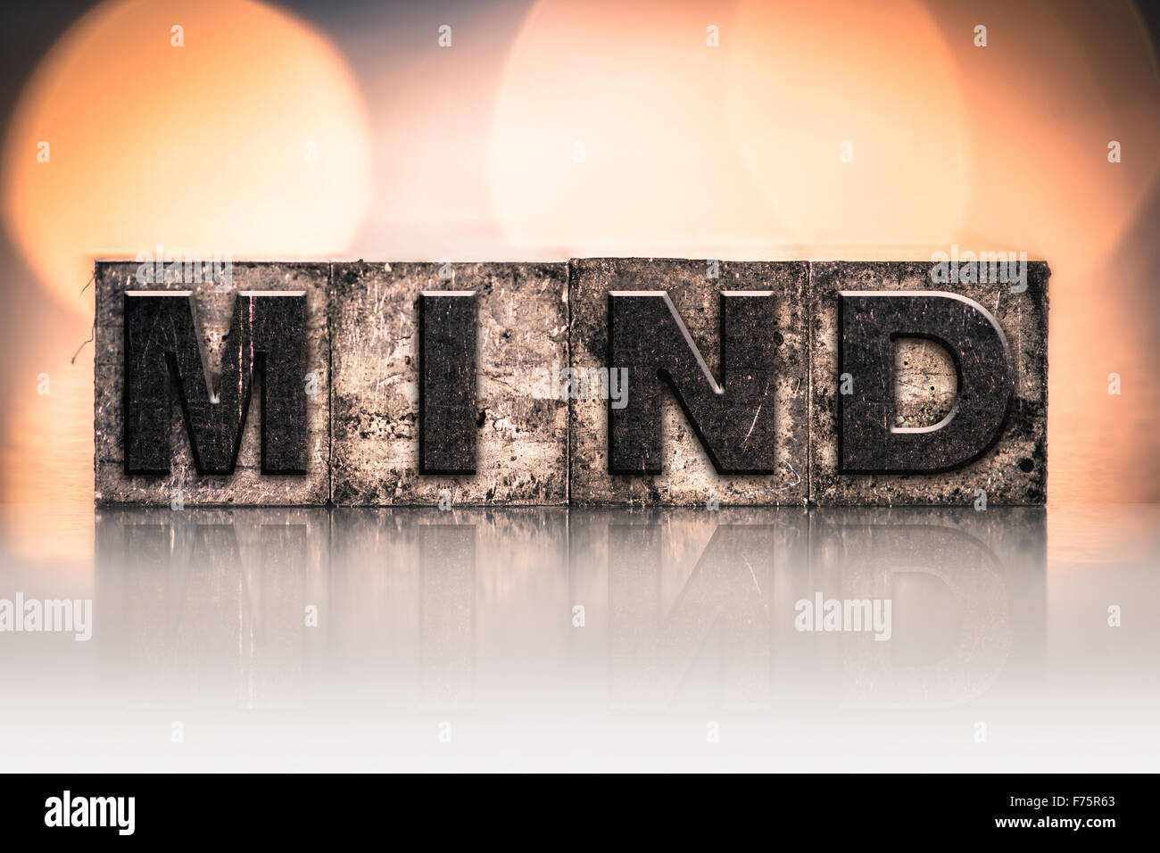 The word "MIND" written in vintage ink stained letterpress type Stock ...